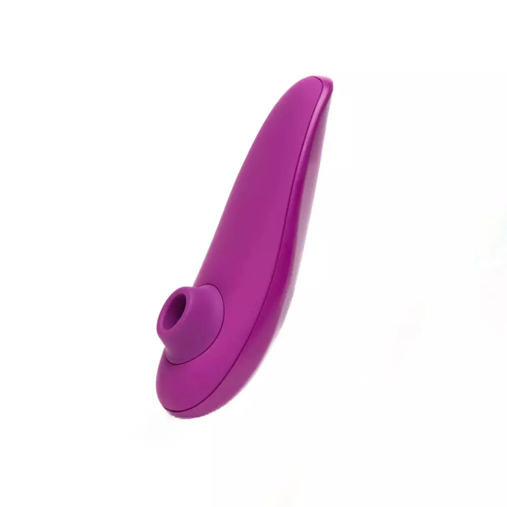Перезаряжаемый клиторальный стимулятор Womanizer Classic фиолетового цвета