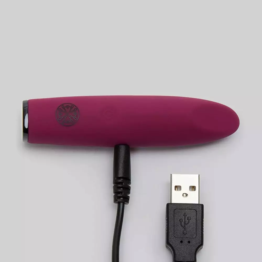 Vibrador de bala magenta com cabo de carregamento