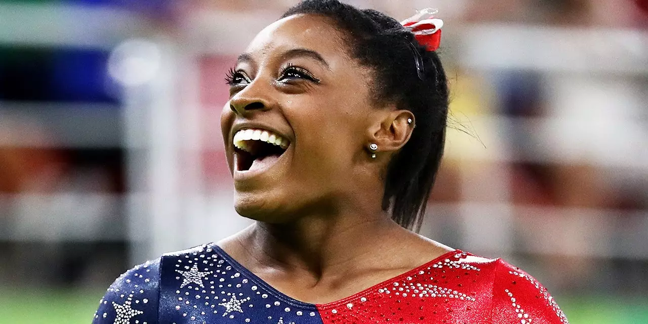 Simone Biles Baru Mendapat Tatu Olimpik Pertamanya di Tempat Yang Tidak Anda Jangkakan